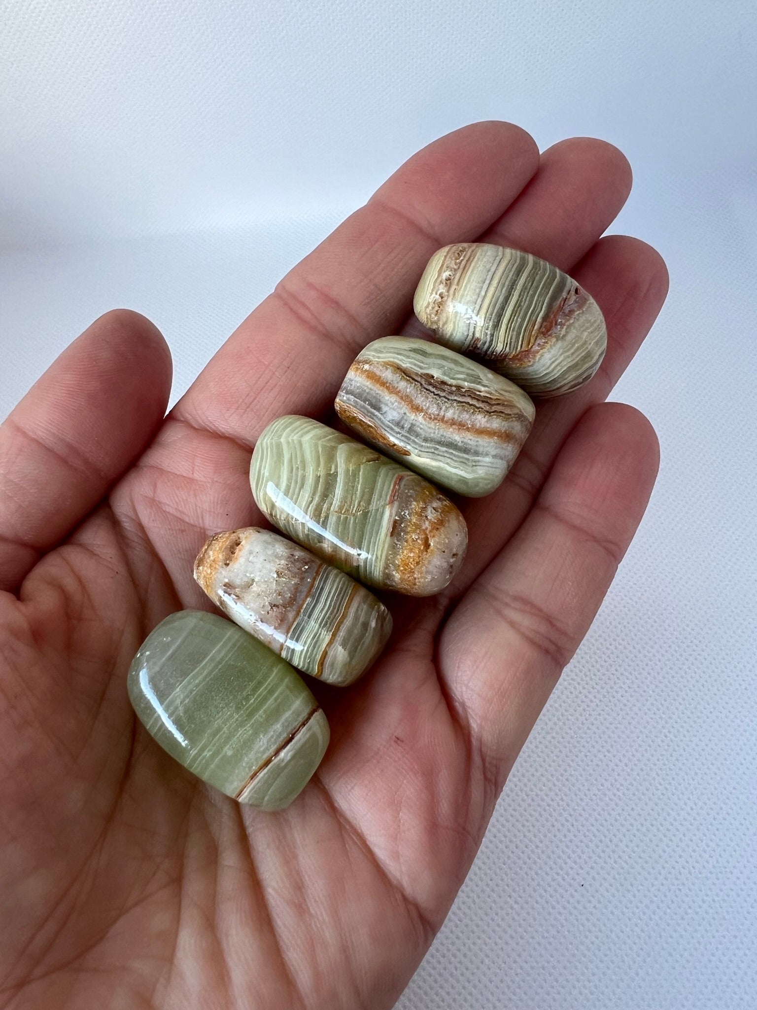 Banded Calcite Tumbled Stone – The Dream Merchants